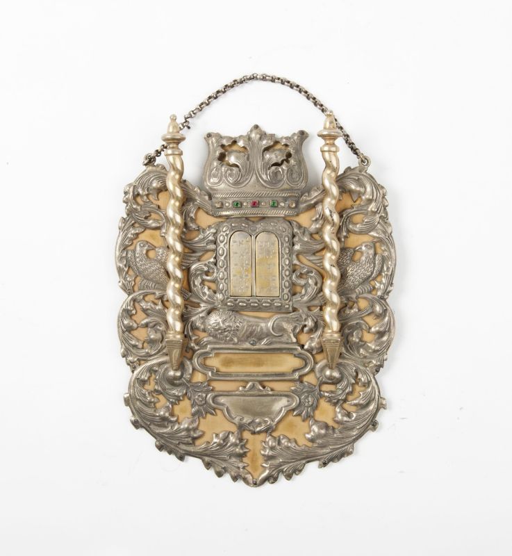 Torah shield with dedicatory inscription, decorated with crouching lion ...