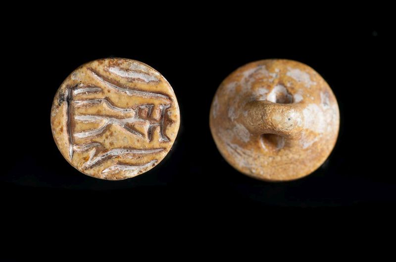 Button-shaped seal amulet depicting two figures of the Hippopotamus ...