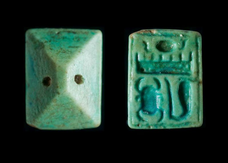 Pyramid-shaped design amulet depicting the throne name of Thutmose III ...