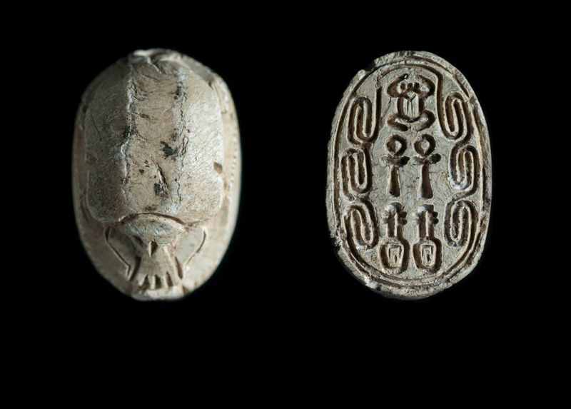 Scarab depicting a column of good-luck hieroglyphs: a scarab alongside ...