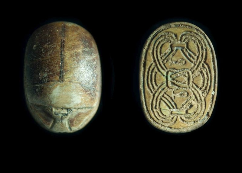 Scarab depicting a design of woven coils with "nefer" signs | The ...