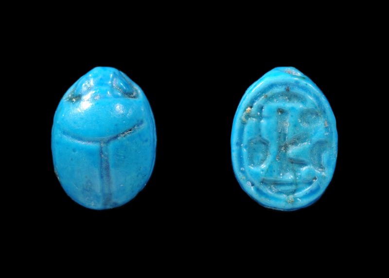 Scarab depicting a red crown and "nefer" between "neb" signs | The ...