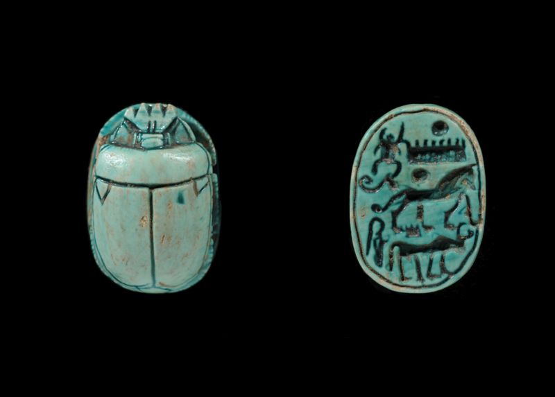 Royal-name scarab of Thutmose III and the epithets "image of Re" "Lord ...